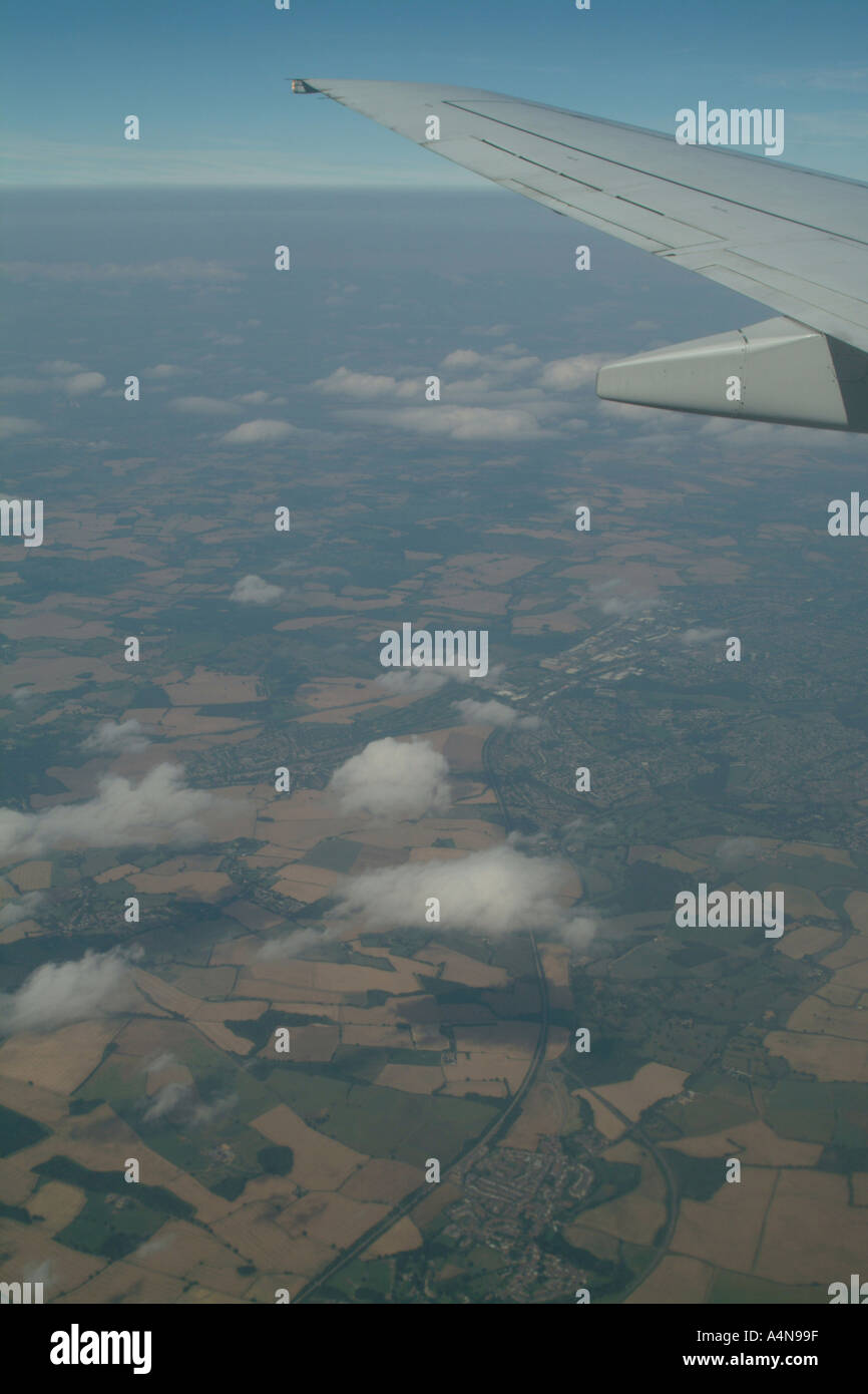View from aeroplane window of wing and horizon Stock Photo - Alamy