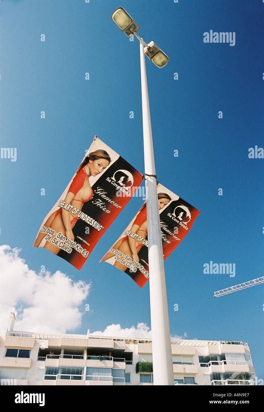 Poster advertising on streetlamp pole in Ibiza Stock Photo - Alamy
