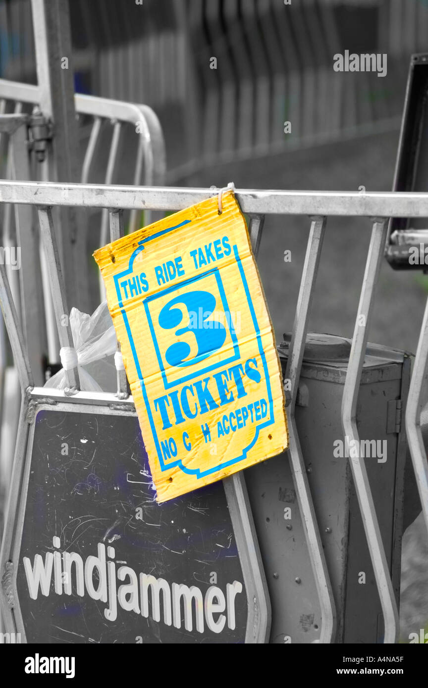 Sign on carnival midway amusement ride indicating the number of tickets ...