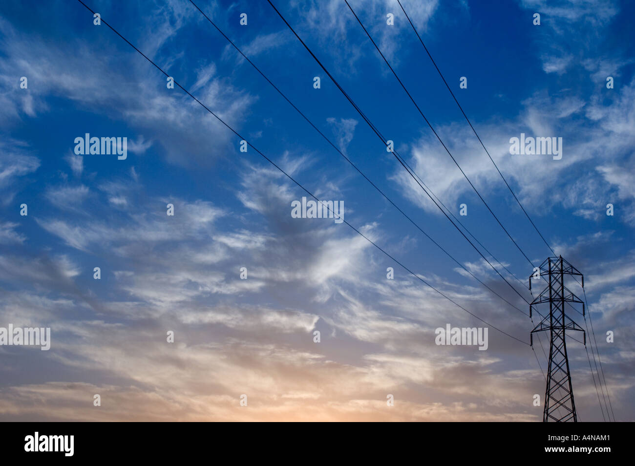 Electrical Power Lines At Sunrise Sunset Blue Cloudy Sky Stock Photo ...