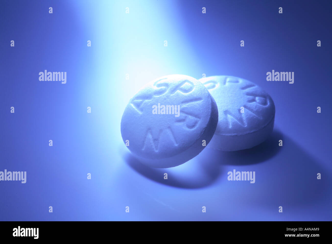 Two aspirin at nighttime Stock Photo - Alamy