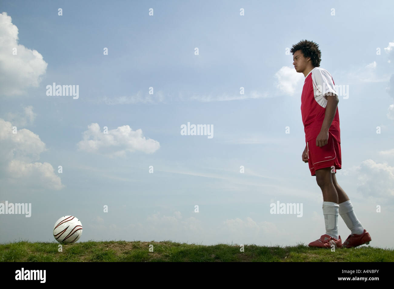 Foot kicking soccer ball hi-res stock photography and images - Alamy