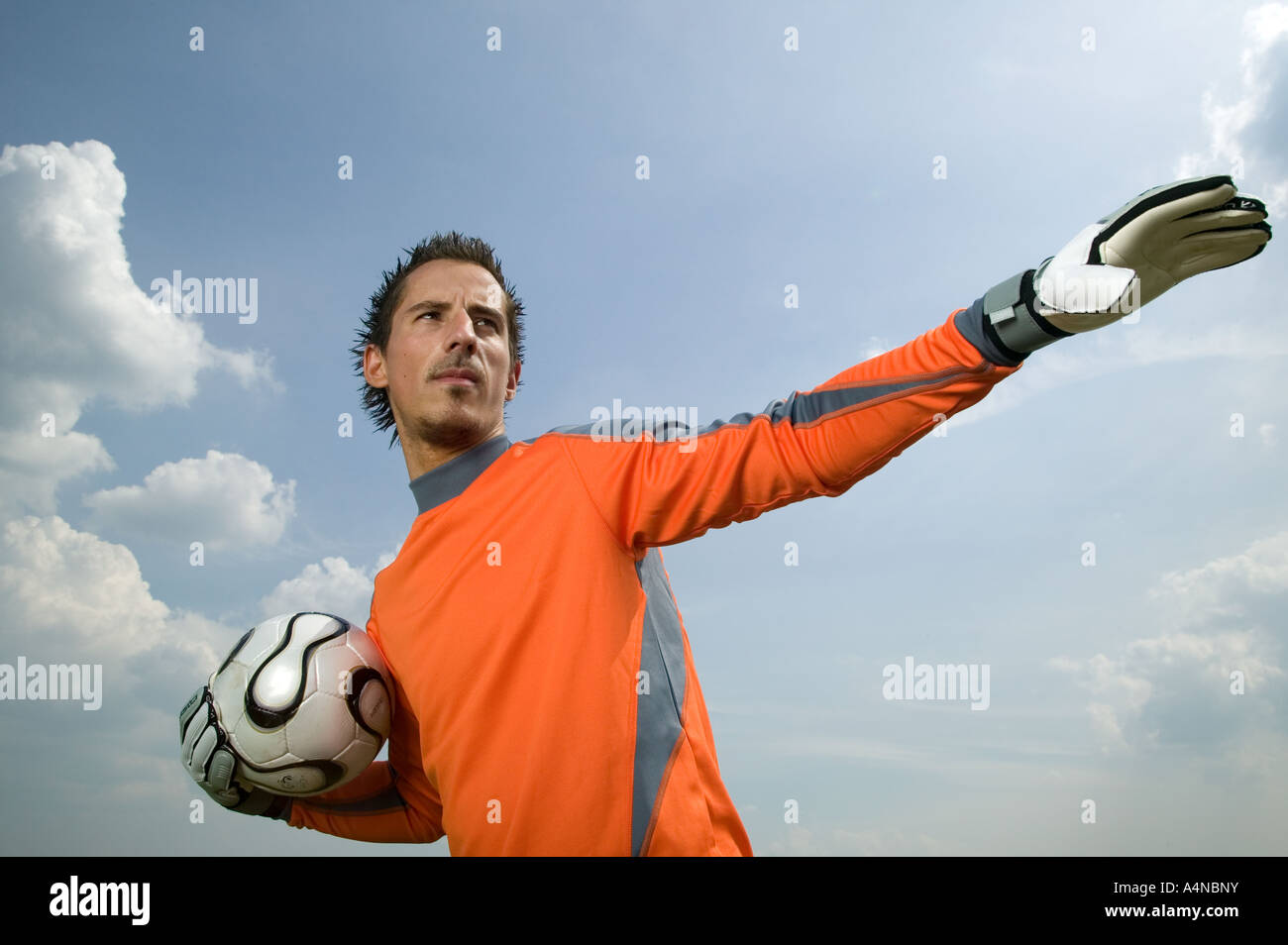 Goalkeeper man throwing ball hi-res stock photography and images - Alamy