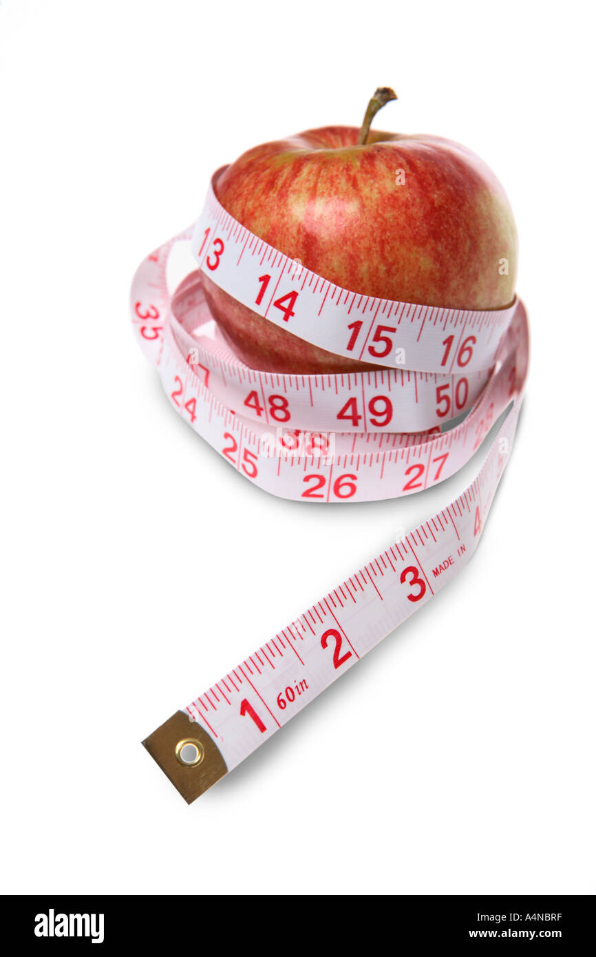 Measuring tape around apple Stock Photo - Alamy