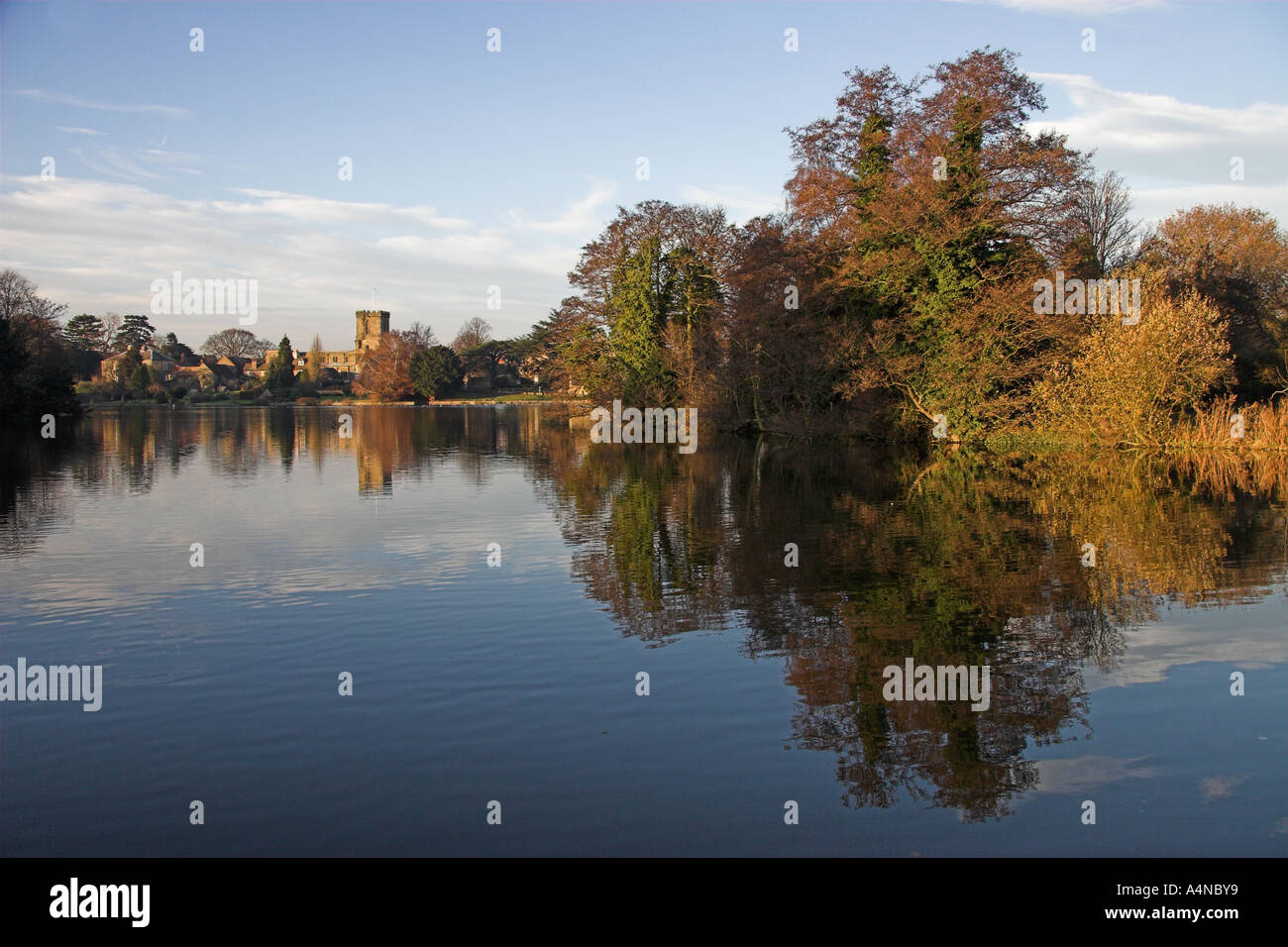 View across Melbourne Lake to Melbourne Hall and the church of St ...