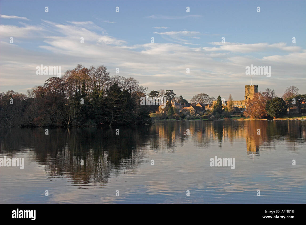 View across Melbourne Lake to Melbourne Hall and the church of St ...