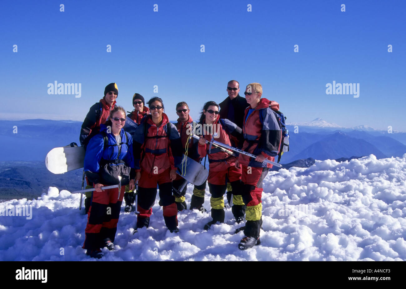 Tourists climbing Villarrica Volcano, group photo, Pucon, Lake District ...