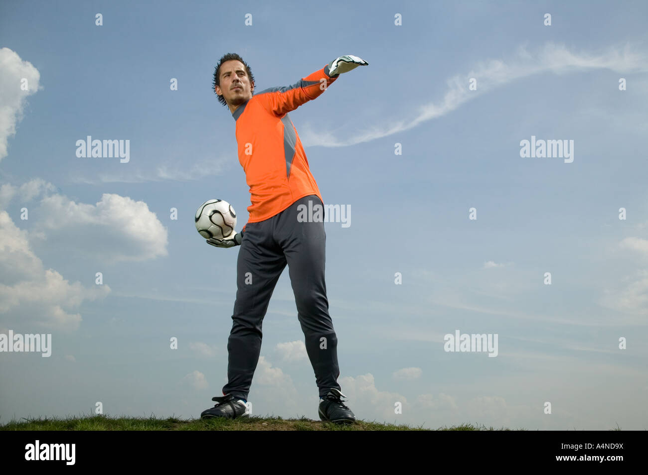 Goalkeeper man throwing ball hi-res stock photography and images - Alamy