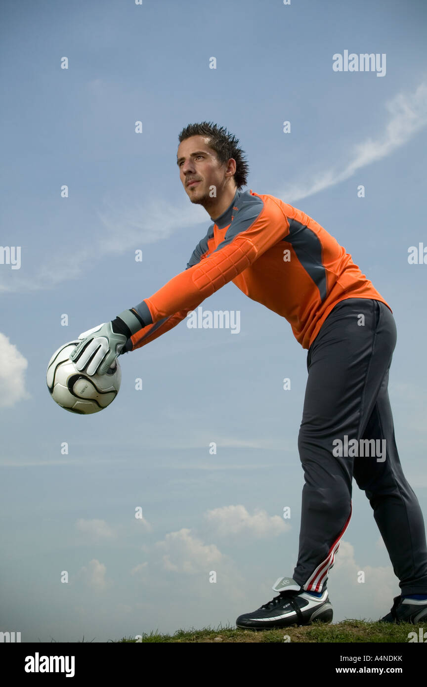 Football keeper goalie kick kicking hi-res stock photography and images ...