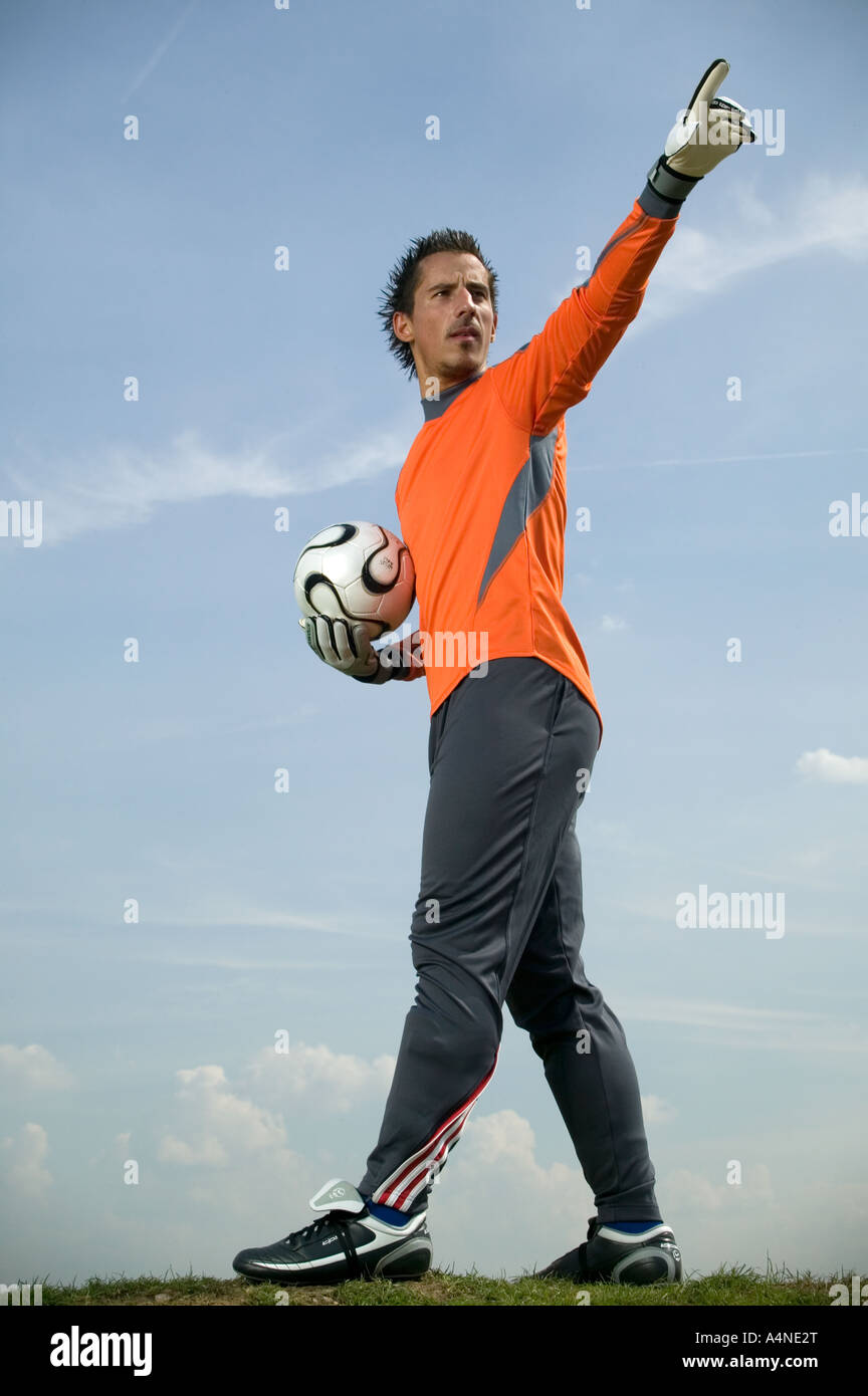 Goalkeeper man throwing ball hi-res stock photography and images - Alamy