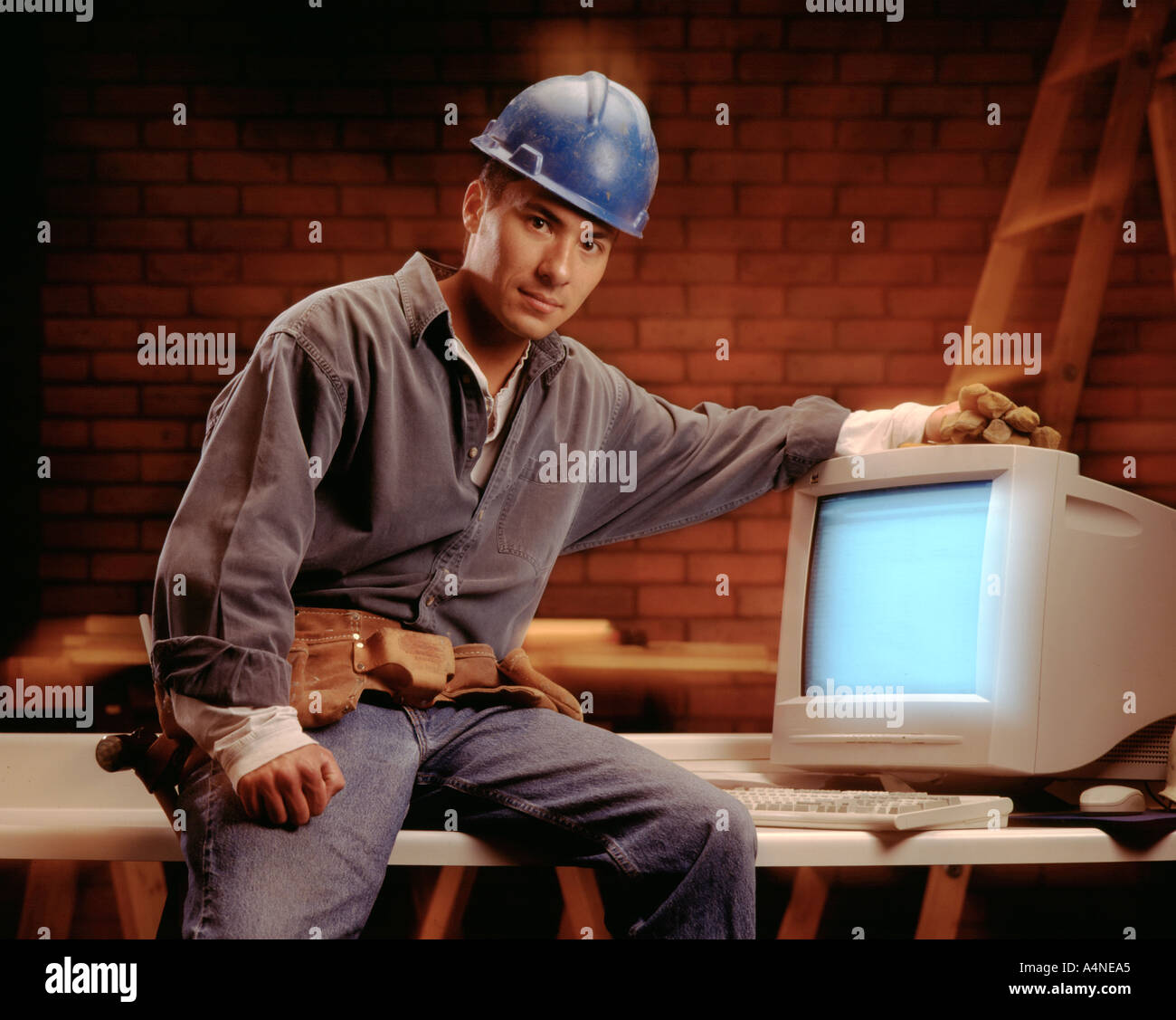 construction worker and architect at work site with blueprints Stock ...