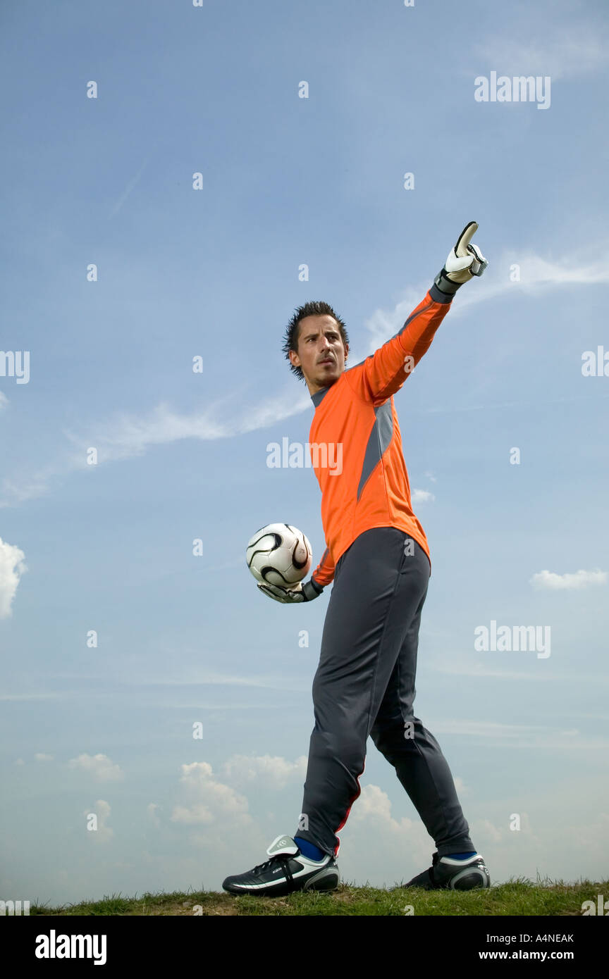 Goalkeeper man throwing ball hi-res stock photography and images - Alamy