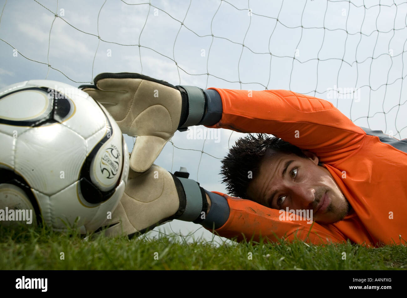 Saving a goal Stock Photo - Alamy