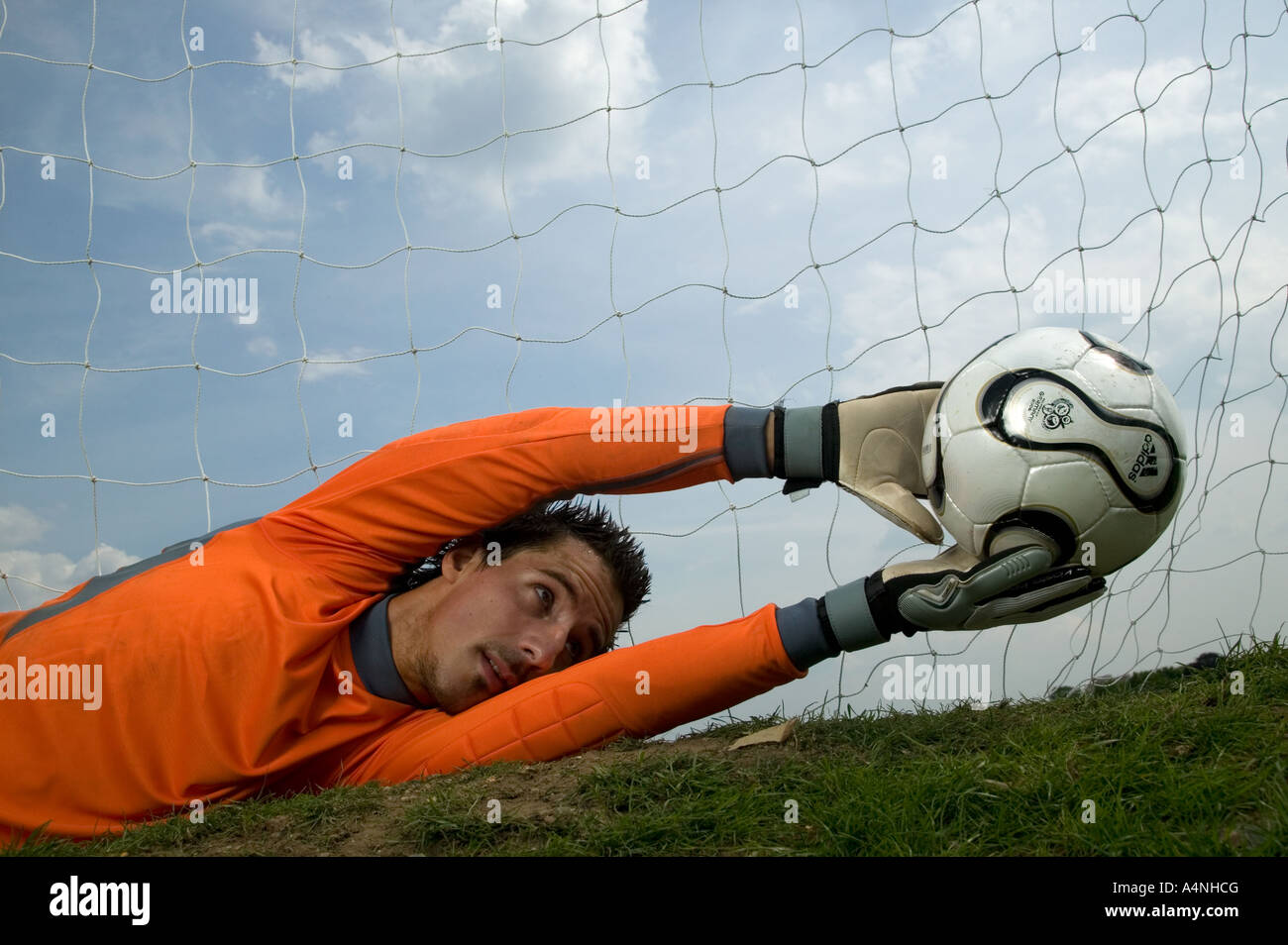 Saving a goal Stock Photo - Alamy