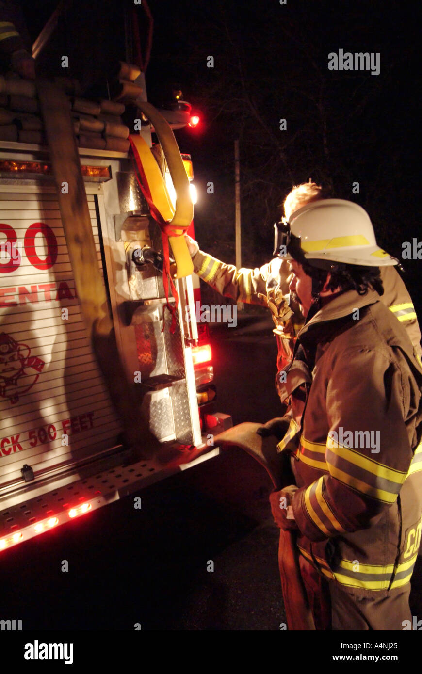 Fire department pulling hi-res stock photography and images - Alamy