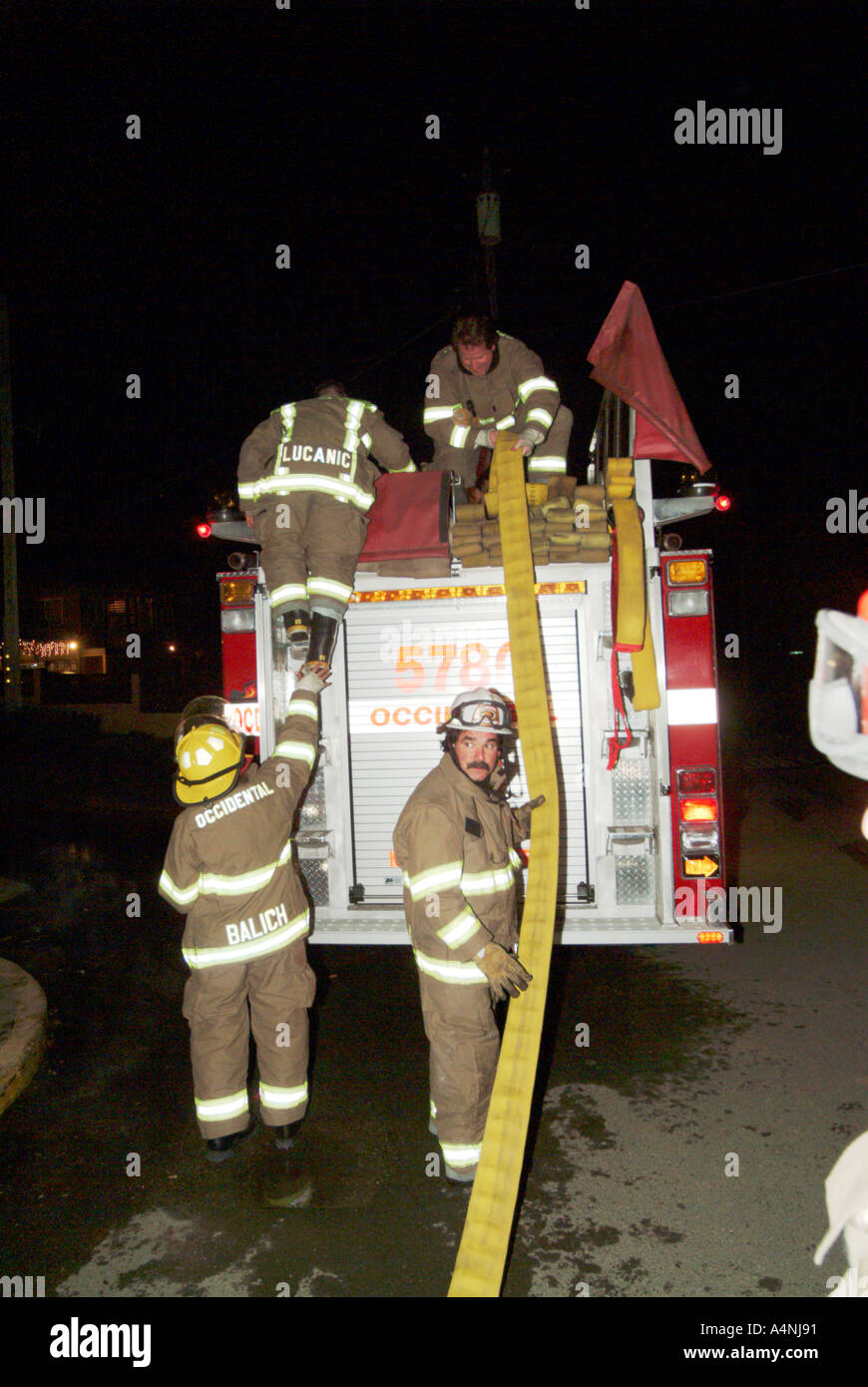 Firefighters from the Occidental Volunteer Fire Department practice ...