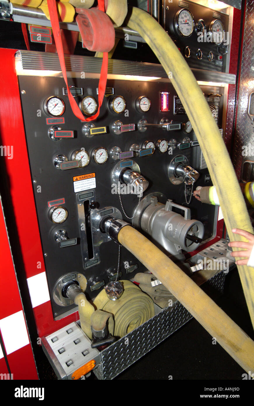 Firefighter pulling a hose hi-res stock photography and images - Alamy