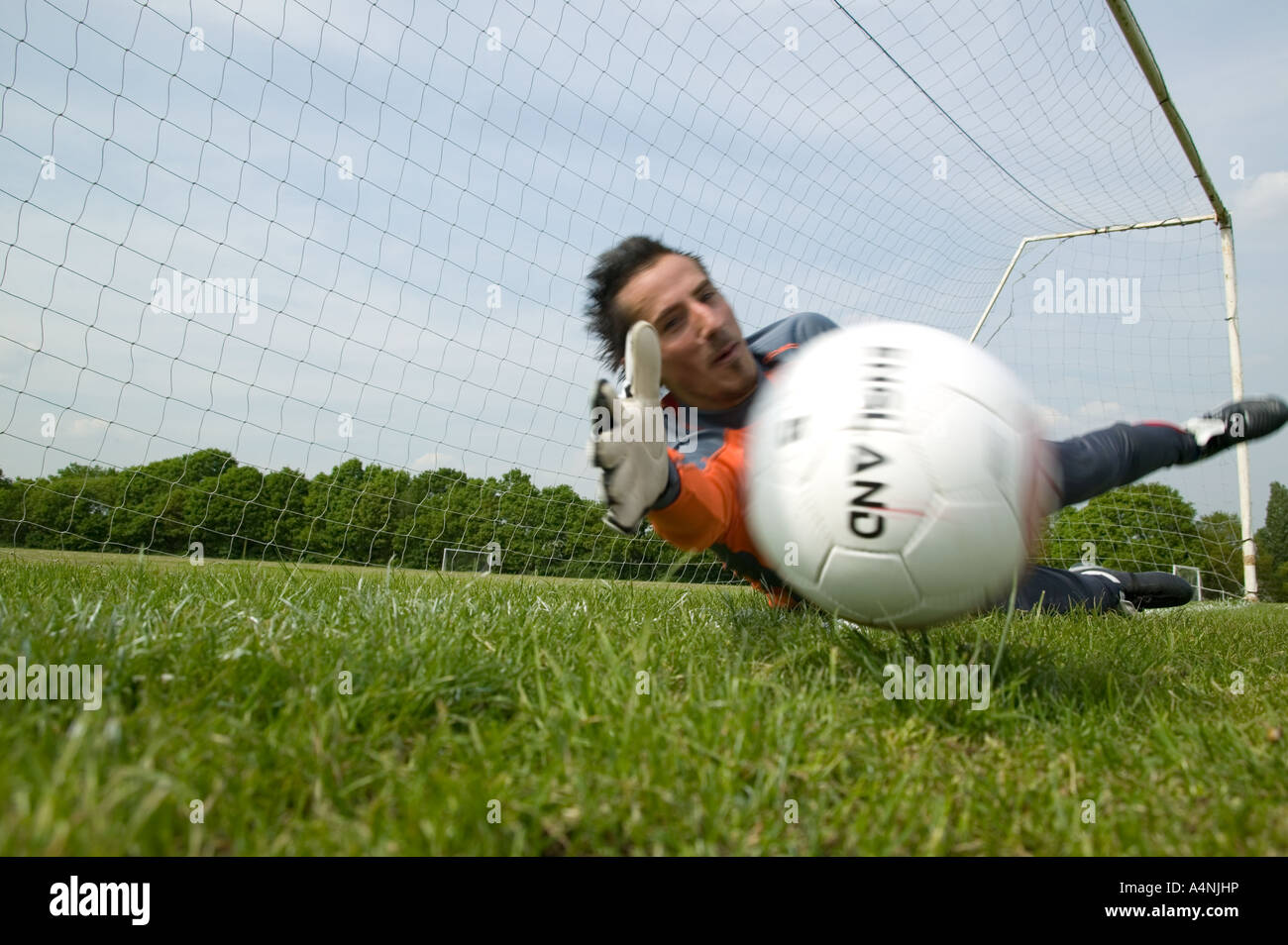 Saving a goal Stock Photo - Alamy