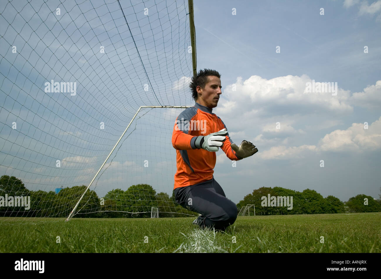 Saving a goal Stock Photo - Alamy
