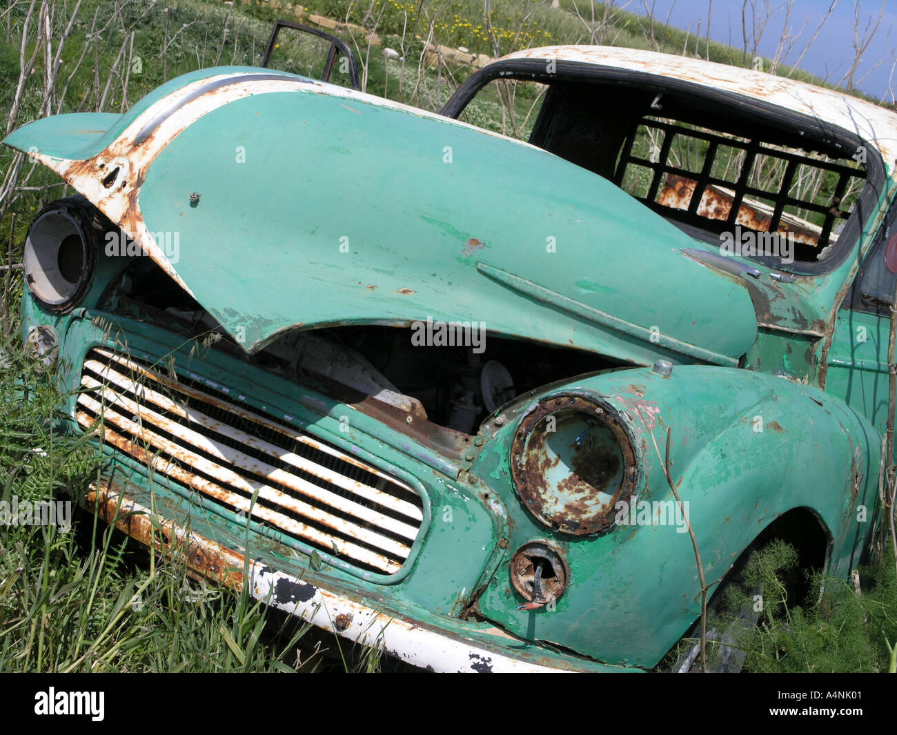 Trashed Morris Minor Van in a field in Gozo Malta Stock Photo - Alamy