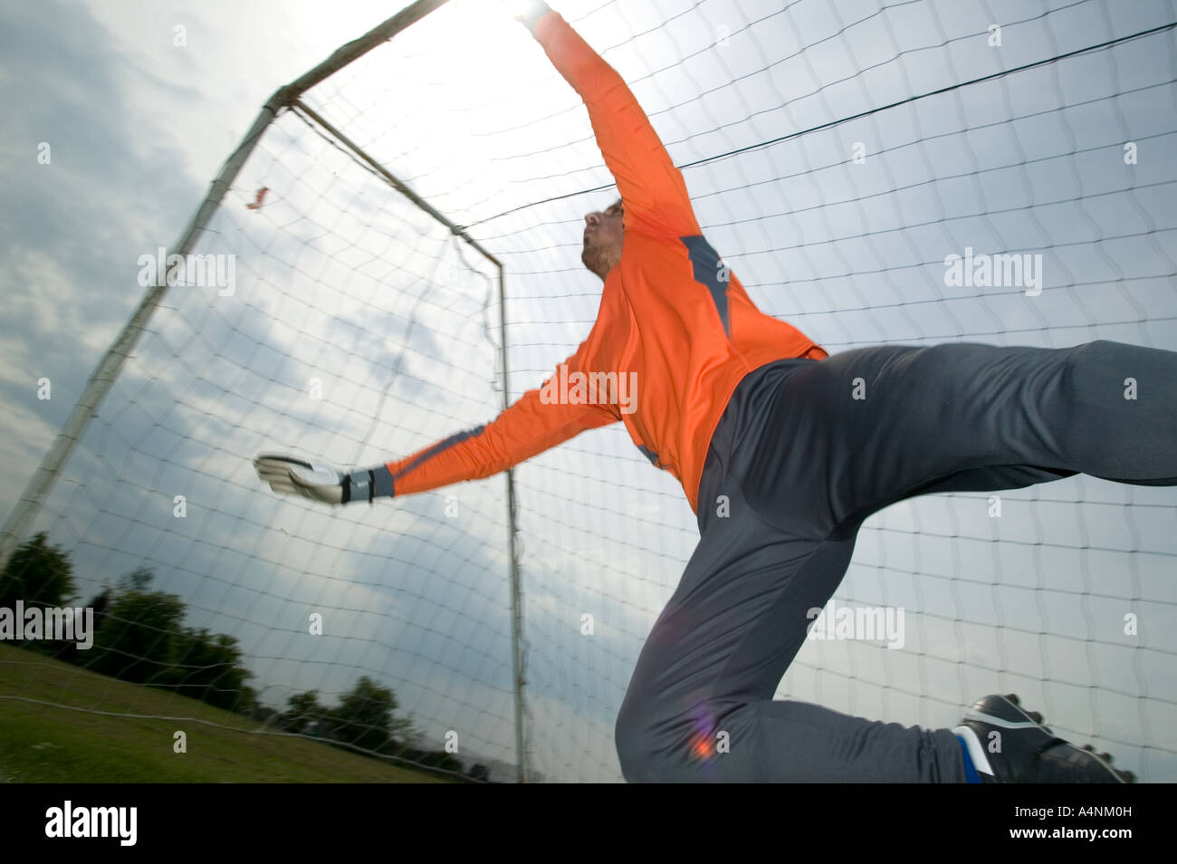 Saving a goal Stock Photo - Alamy