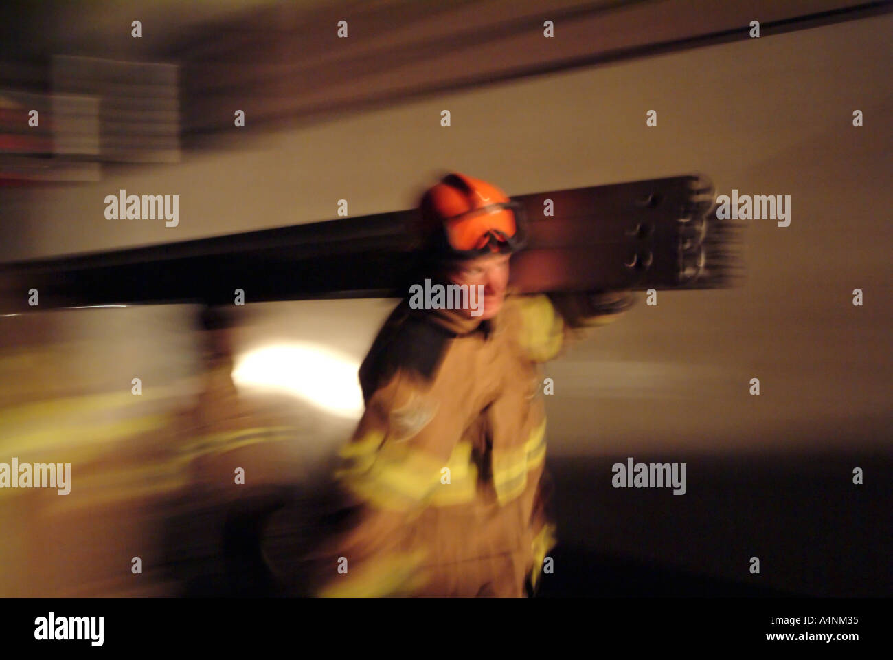 Firefighter trainees practice their skills with ladders Stock Photo - Alamy