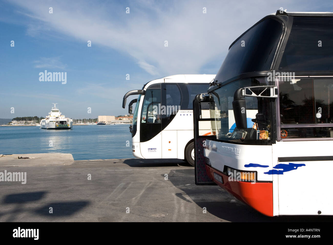 Coaches waiting for the Brac to Split ferry in Split harbour Croatia ...