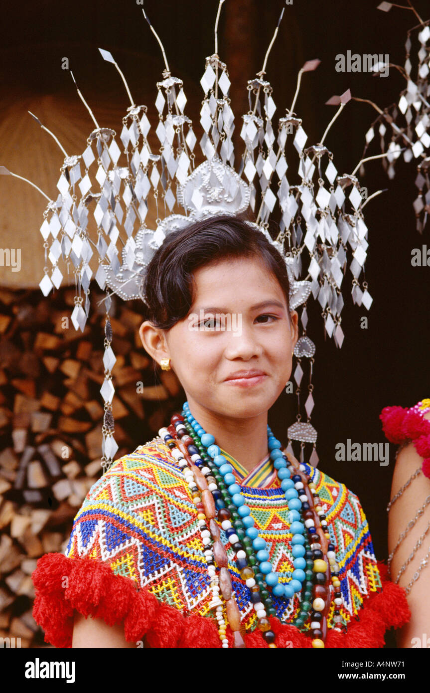 Head and shoulders portrait of an Iban girl Sarawak island of Borneo ...