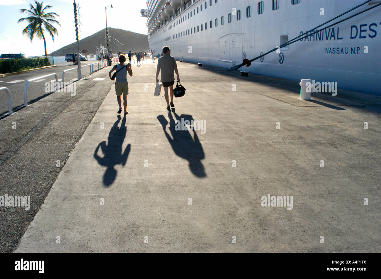 Carnival Destiny cruise ship in Barbados and passengers returning and ... Carnival Destiny cruise ship in Barbados and passengers returning and ...