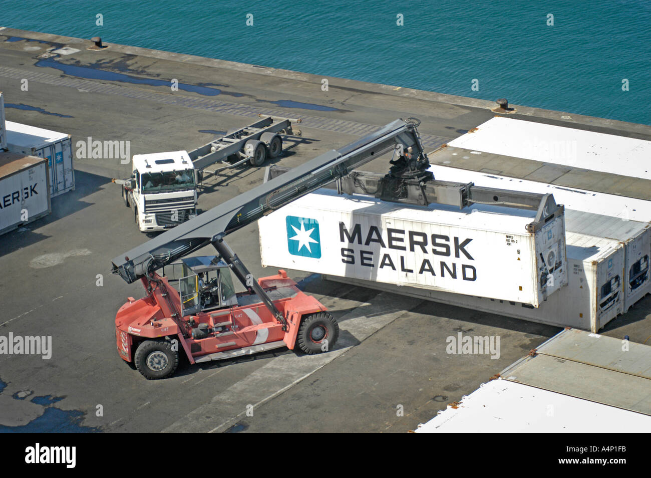 Shipping Containers being loaded on trucks in the port of Martinique in ...