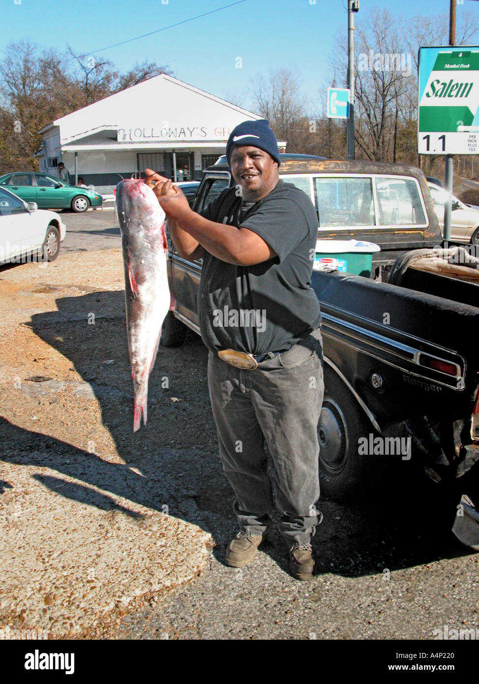 black man in 50s who is a Fisherman in Memphis area with his catch from ...