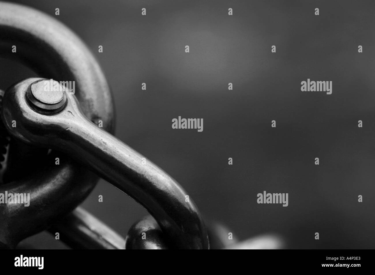 Abstract of metal loop with chain attached fife scotland Stock Photo ...