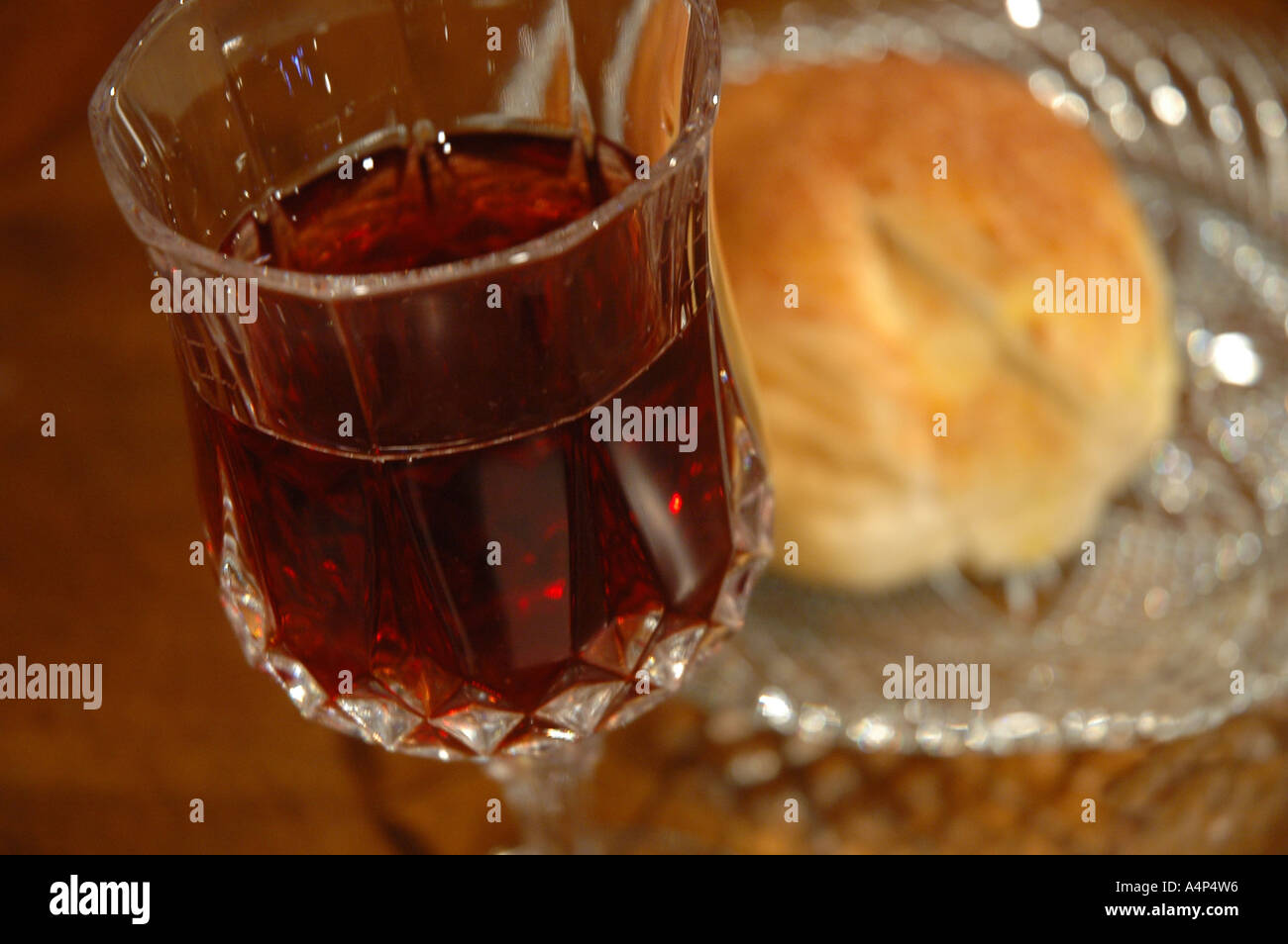 Holy Eucharist Communion red wine and white bread Stock Photo - Alamy
