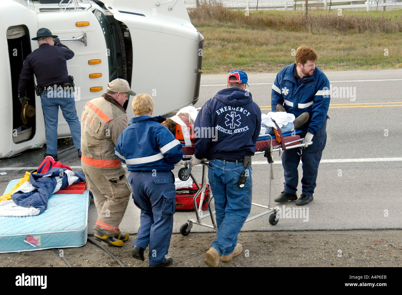 Semi tractor trailer overturns causing an accident with injury Stock ...