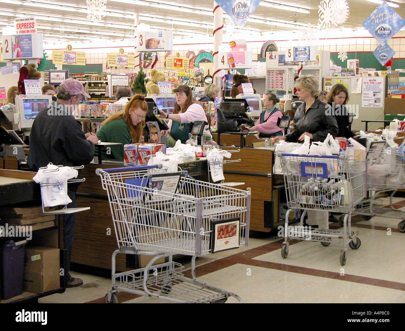 Check out activity in a large grocery store Stock Photo - Alamy