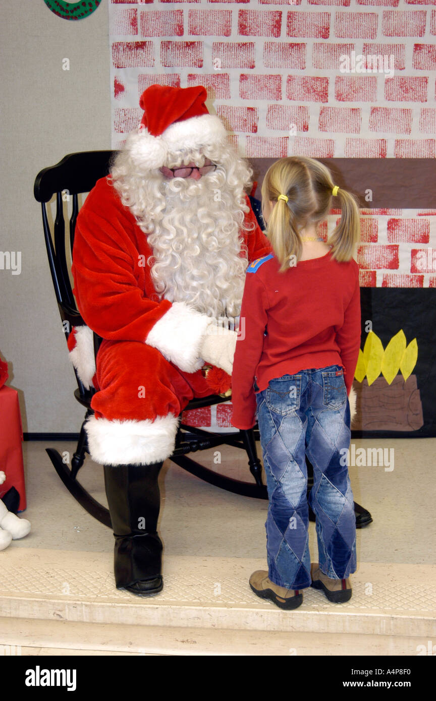 Kid and santa and lap hi-res stock photography and images - Alamy