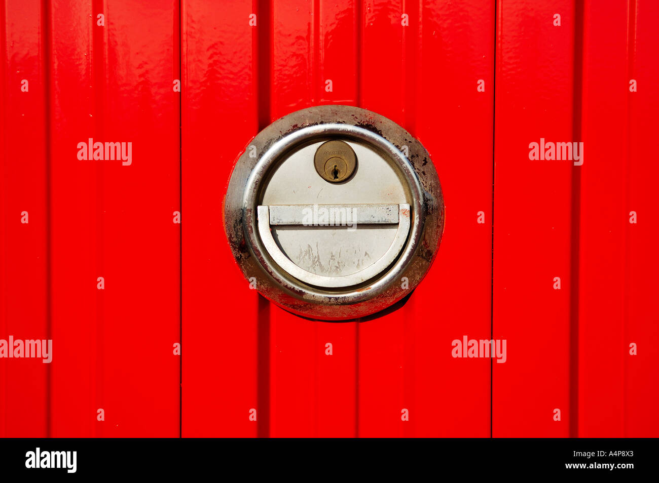 security lock in bright red metal door Stock Photo - Alamy