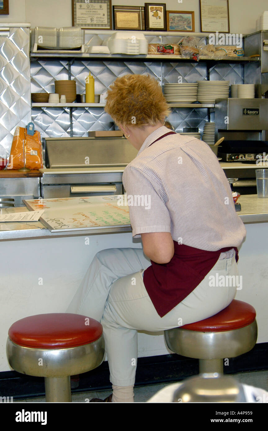 Activities in a small family restaurant Stock Photo - Alamy