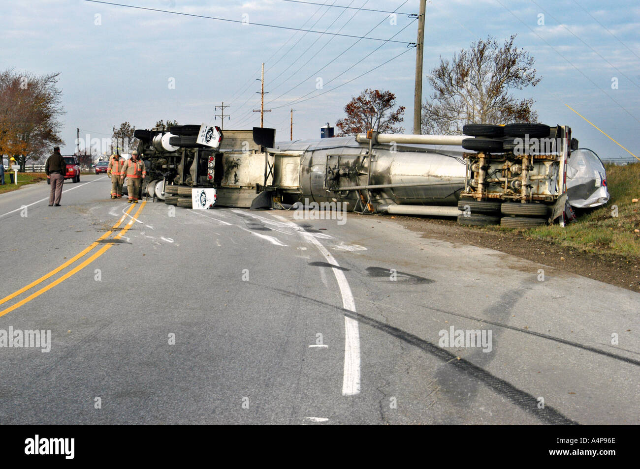 Semi tractor trailer overturns causing an accident with injury Stock ...