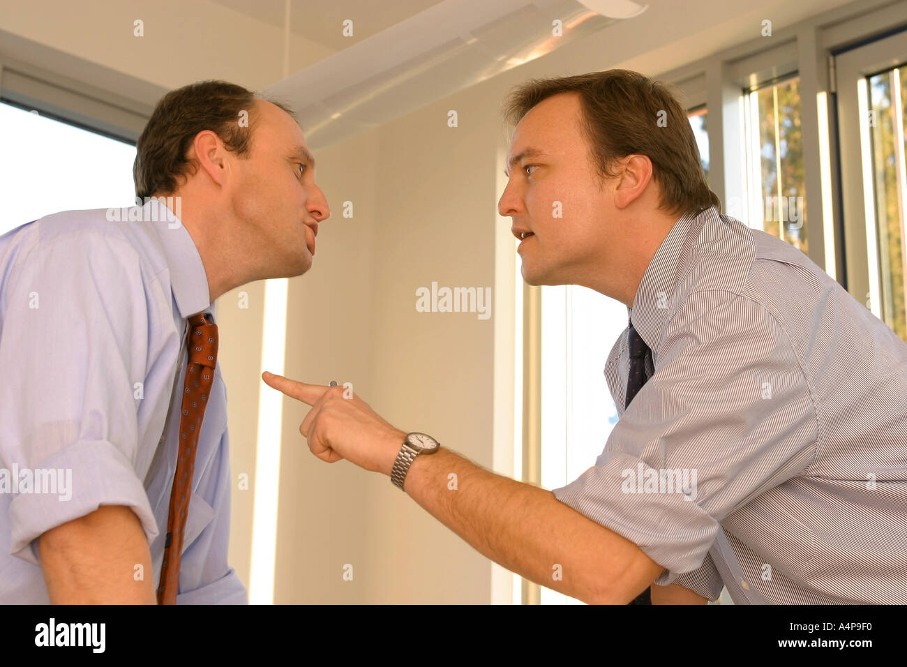 Two business men in office Stock Photo - Alamy