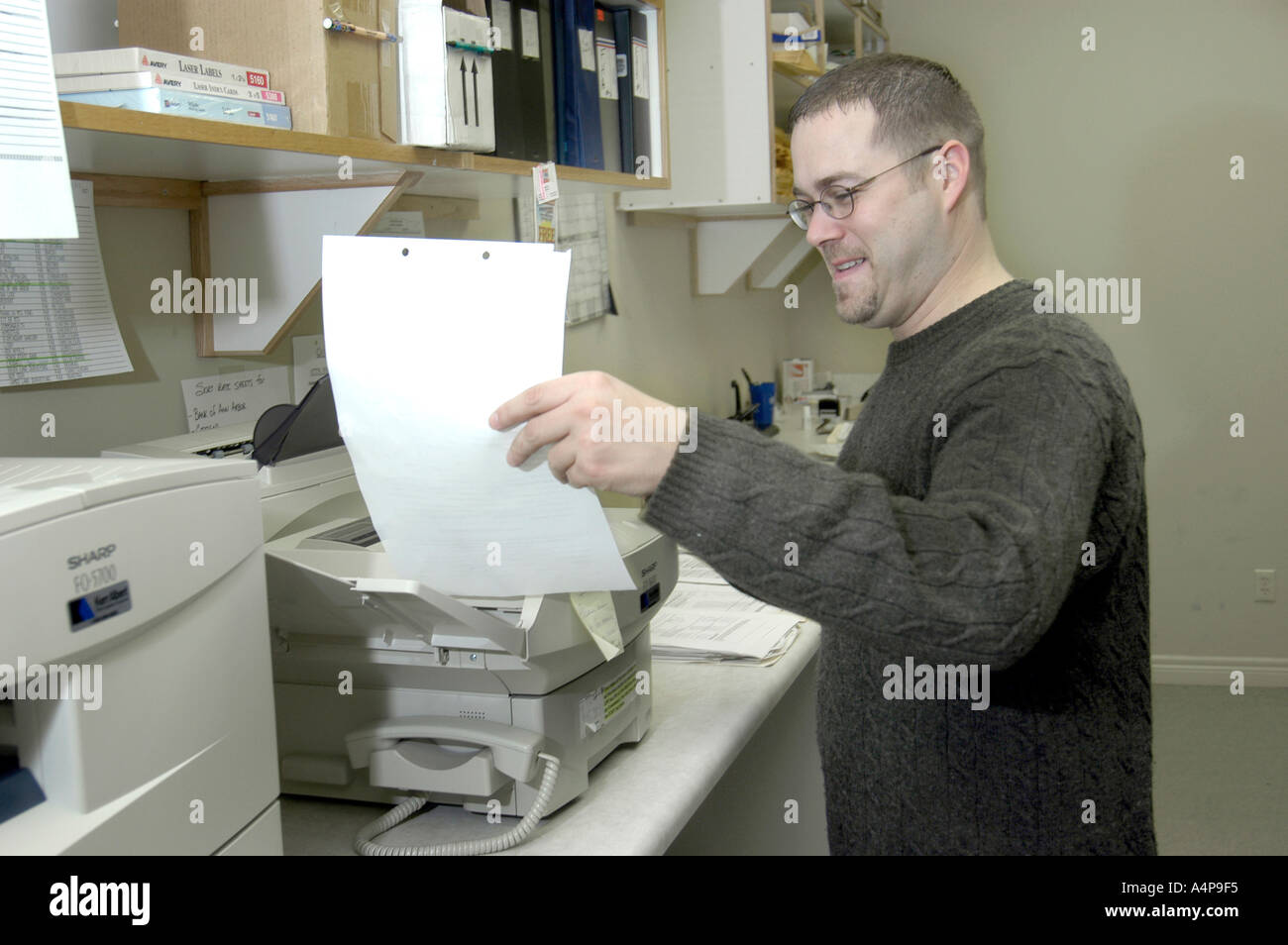 Male businessman fax machine hi-res stock photography and images - Alamy