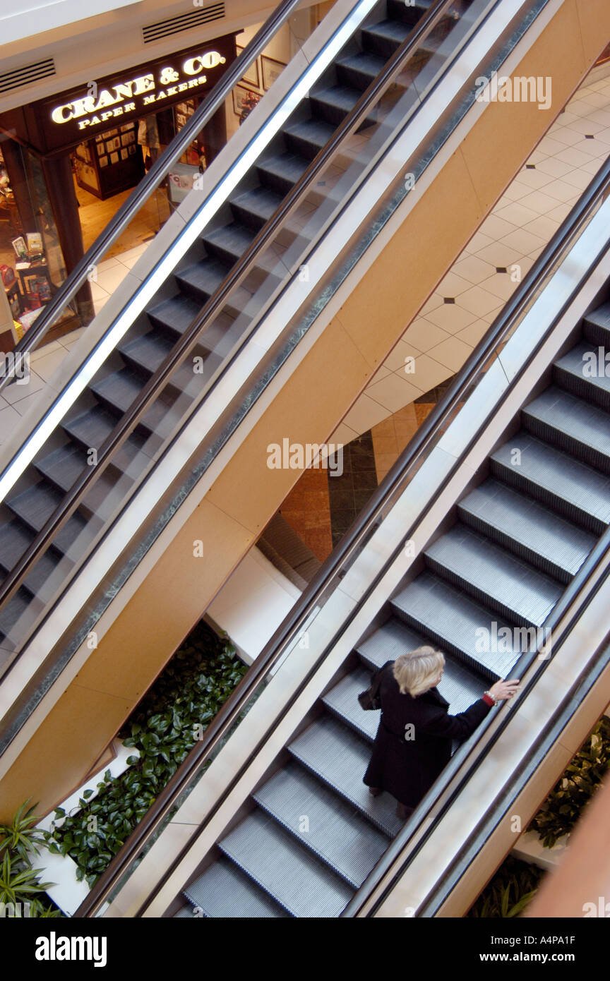 Escalators move shoppers in a large mall complex Stock Photo - Alamy