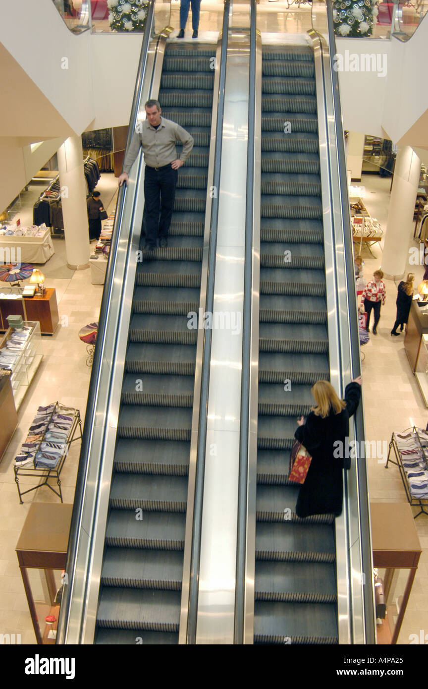 Escalators move shoppers in a large mall complex Stock Photo - Alamy