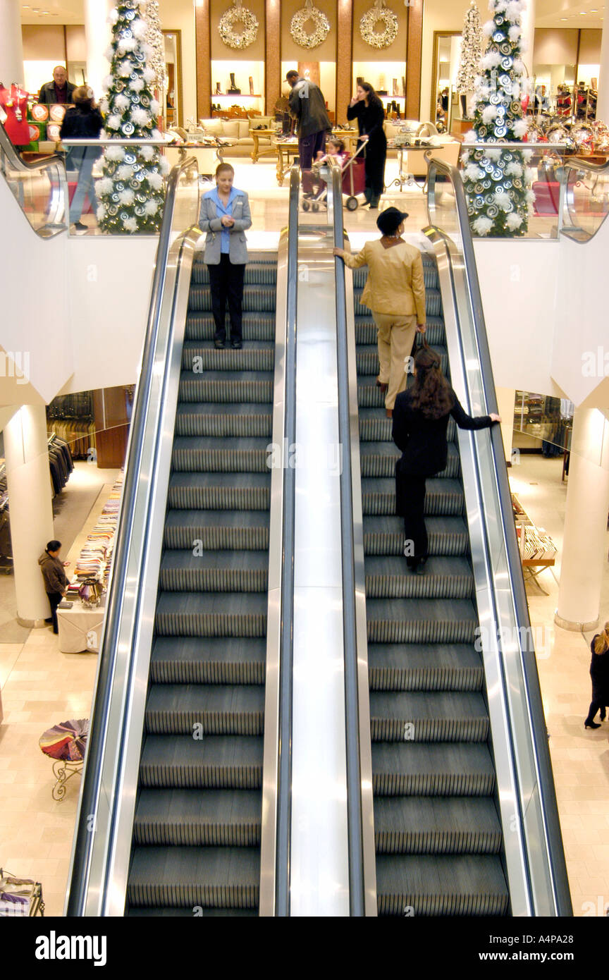 Escalators move shoppers in a large mall complex Stock Photo - Alamy