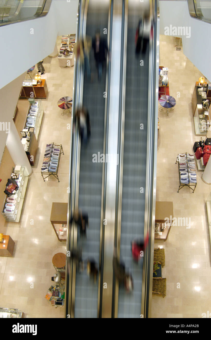 Escalators move shoppers in a large mall complex Stock Photo - Alamy