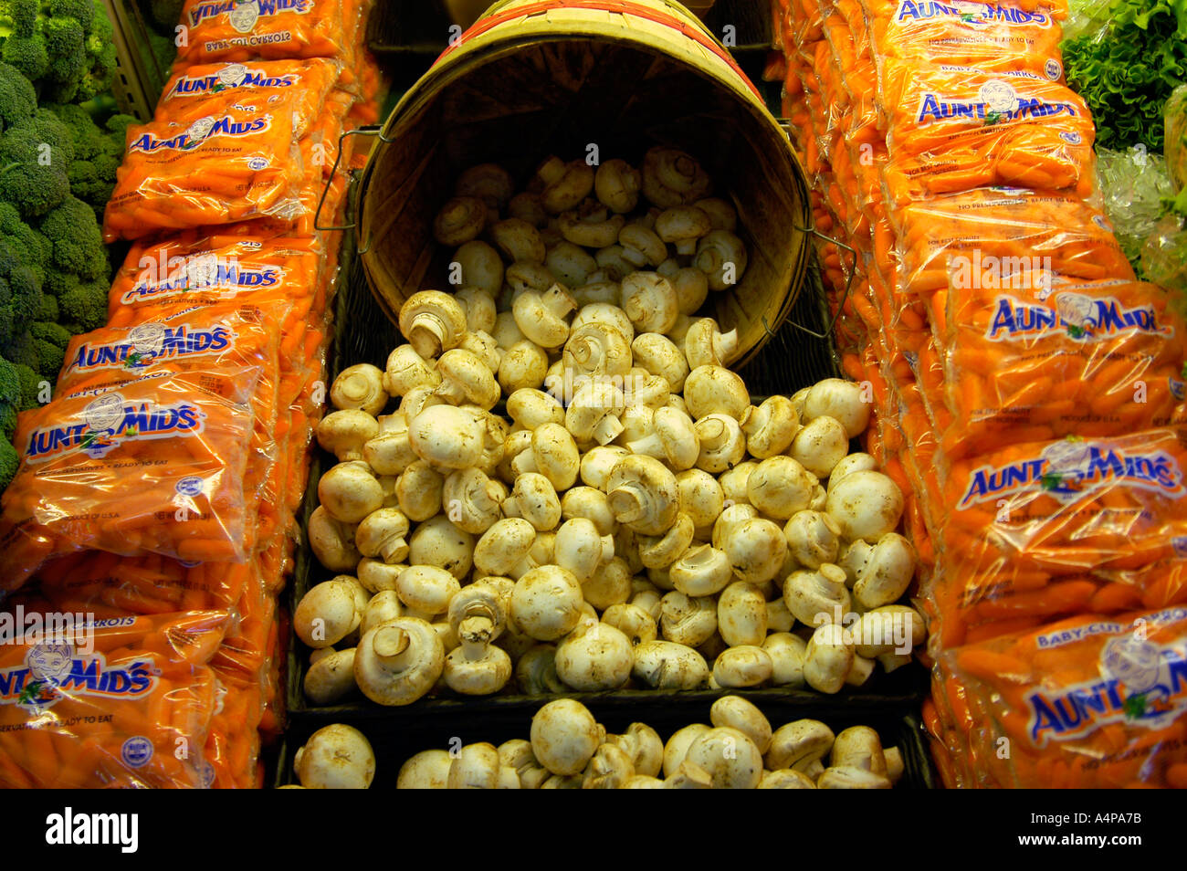 Fresh red meat fish vegetables fruit and poultry on display in a meat ...