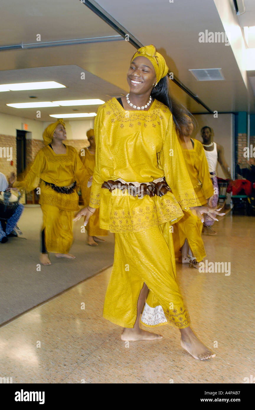 Black female performs dance in native African dress and culture Stock Photo - Alamy