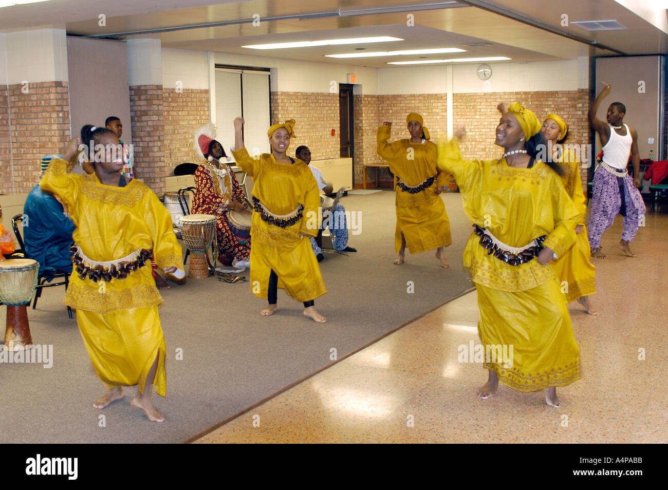 Black female performs dance in native African dress and culture Stock Photo - Alamy