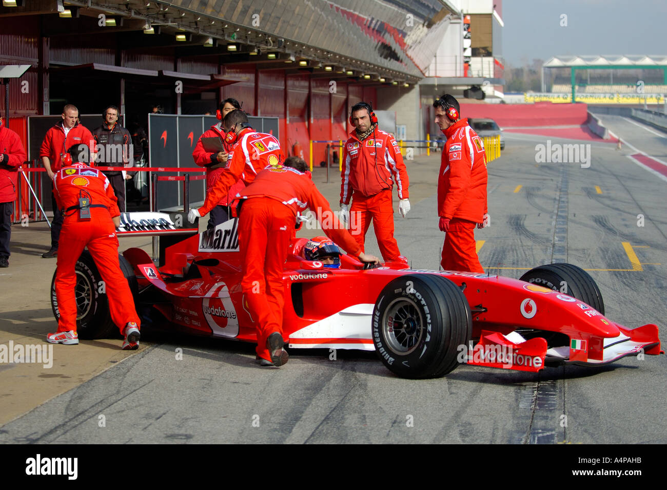 Ferrari in pit-lane Stock Photo - Alamy