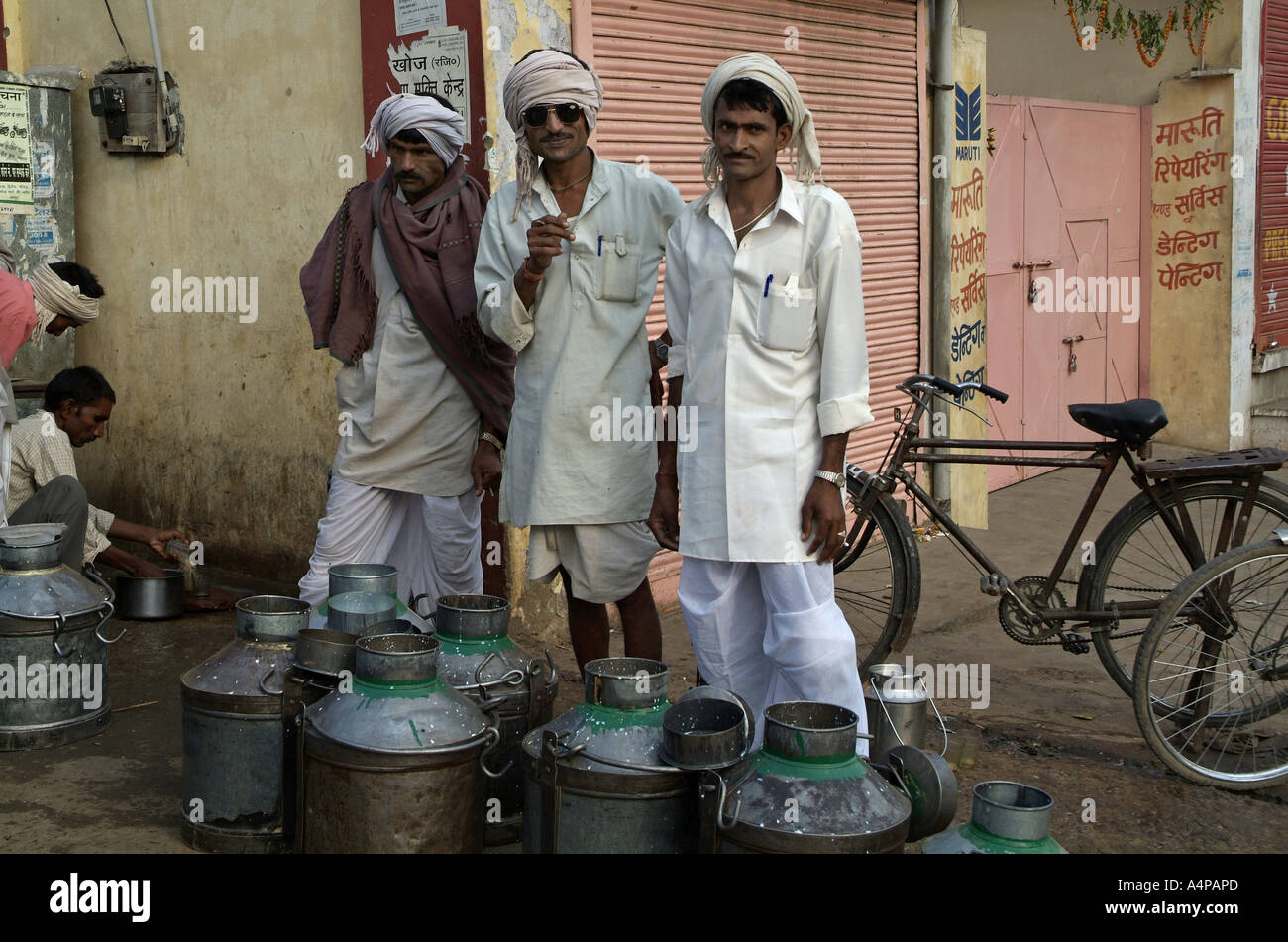Indian men at milk market hi-res stock photography and images - Alamy